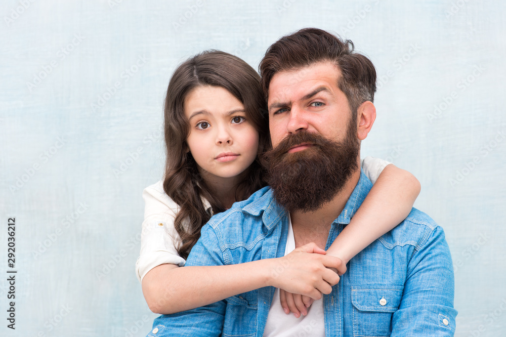 Lovely father and cute kid. Father and daughter hug light background ...