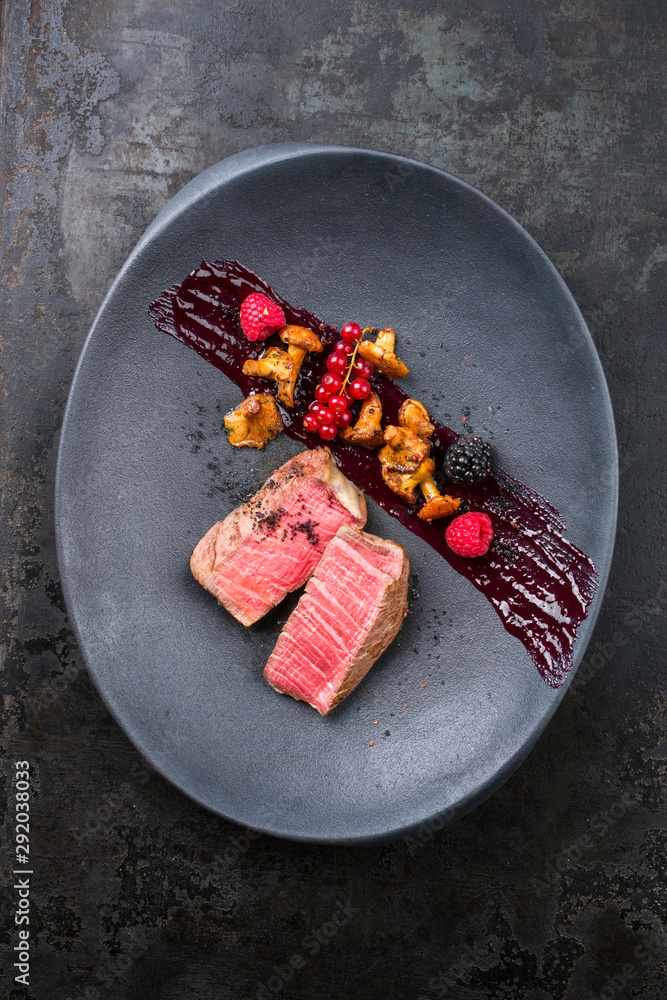 Fried dry aged beef fillet chateaubriand medallion steak natural with ...