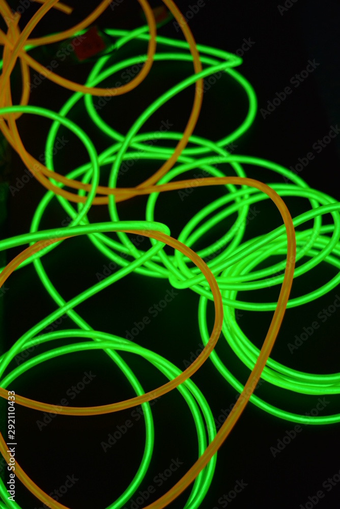 Bright luminous yellow and green, lime neon wires in different formats ...