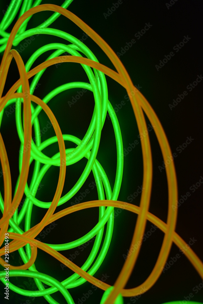 Bright luminous yellow and green, lime neon wires in different formats ...