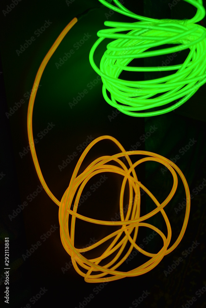 Bright luminous yellow and green, lime neon wires in different formats ...