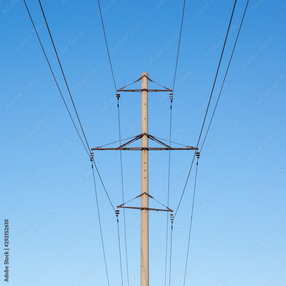 Concrete pillar power lines with traverses and high-voltage wires Stock ...
