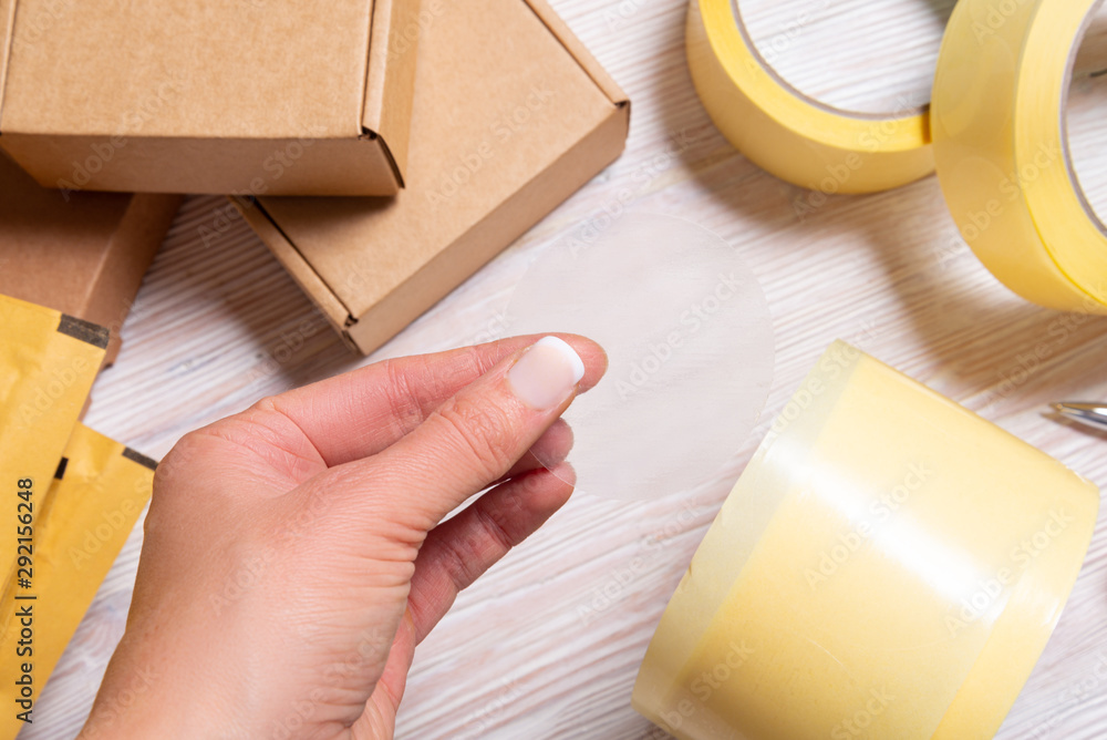 Transparent round sticker for cardboard box wrapping Stock Photo ...