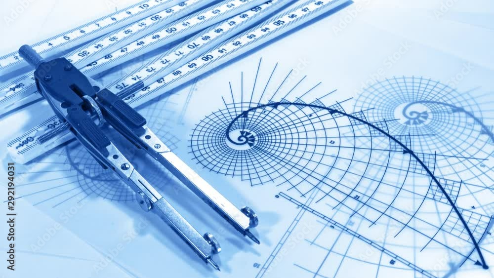 Blueprints - architectural drawings, compass and drawing of the gold ...