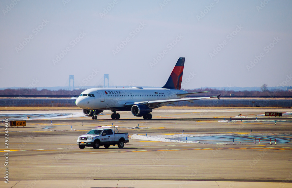 Airplane at the terminal gate ready for takeoff JFK international ...