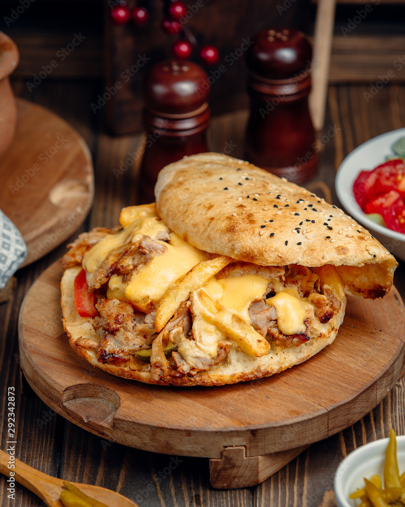 Chicken wrap doner with french fries and vegetables inside Stock Photo ...
