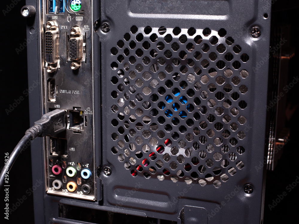 rear panel of the computer with various inputs and connectors for audio ...