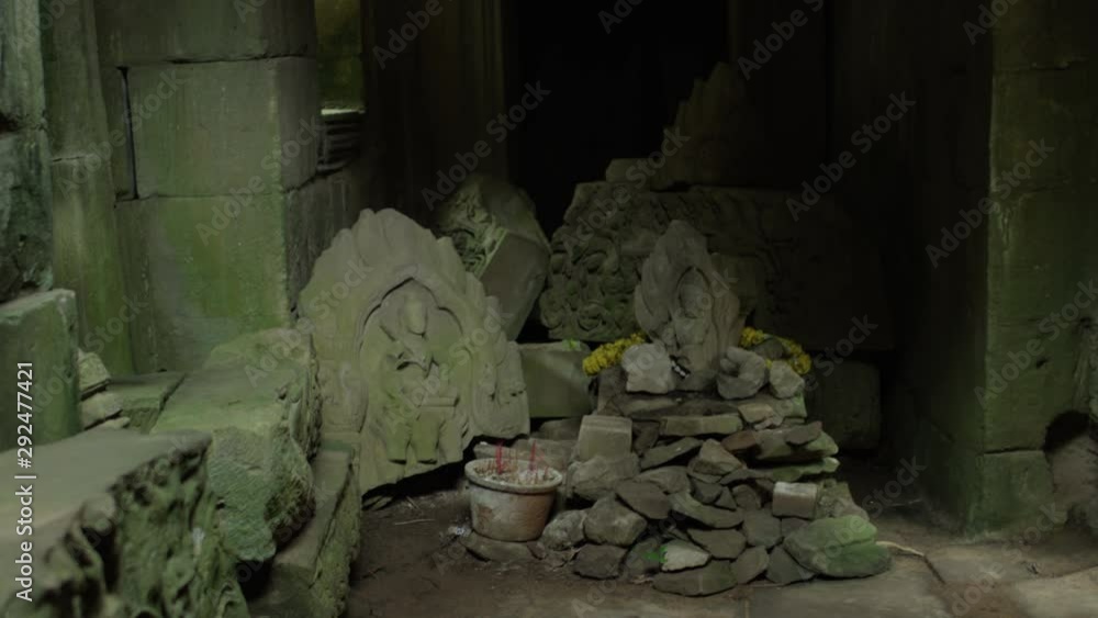 Cambodian Collapsed Temple. Piles of rocks and Carvings laying on the ...