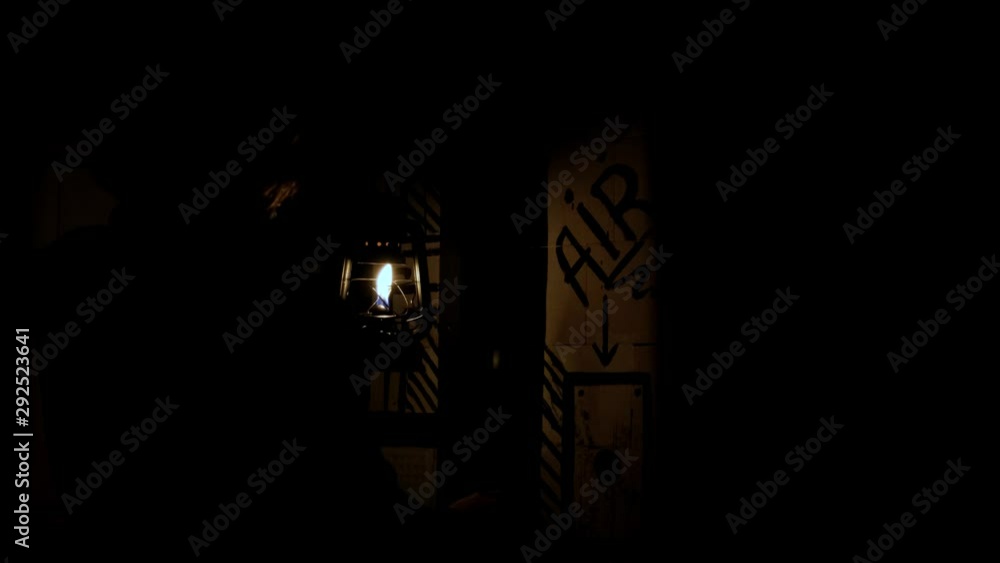 hand with a kerosene lamp presses the air supply button. Oil lamp Stock ...