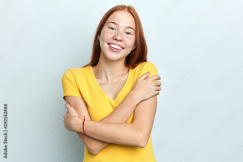 Closeup portrait of funny crazy positive smiling woman hugging herself ...