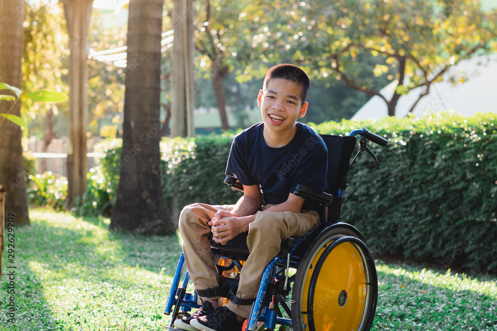 Disabled child on wheelchair is playing, learning and exercise in the ...