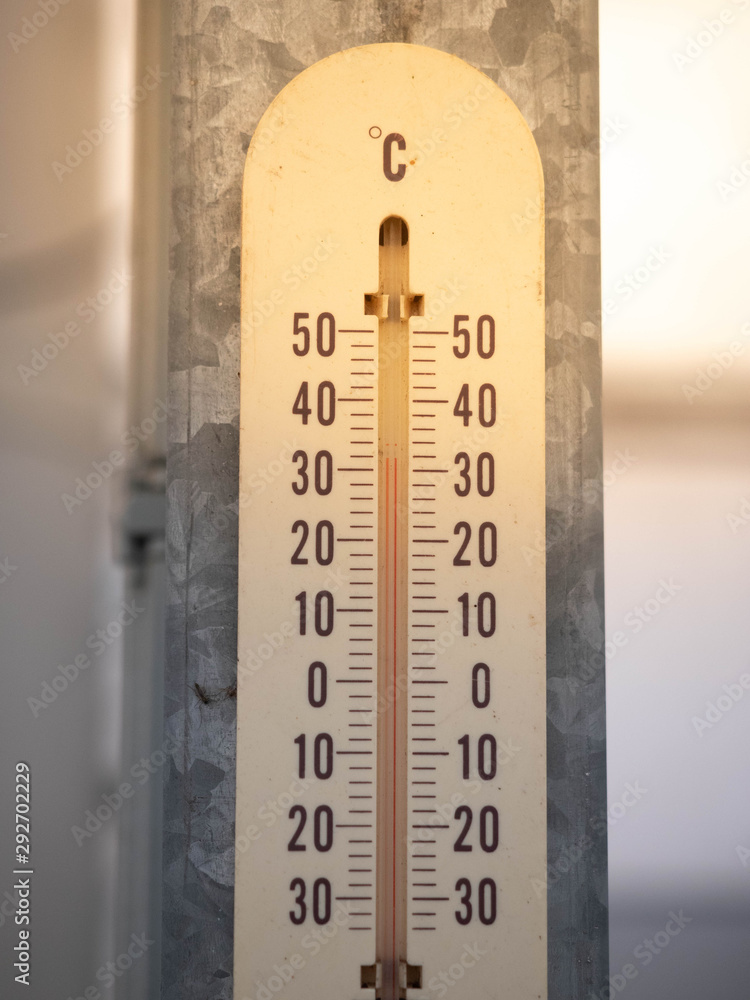 Thermometer hang on metal pole show 31 degree Celsius on a hot summer ...