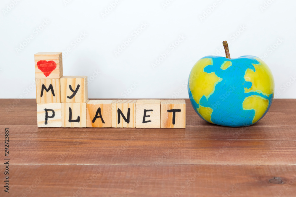 Apple with drawn Earth map, ecology concept. Stock Photo | Adobe Stock