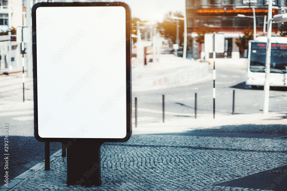 Mockup of the blank information poster in urban settings with paving ...