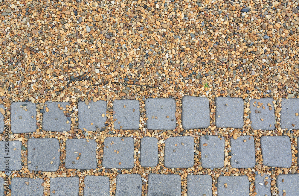 Pattern square stone pavement with gravel background. walking path ...