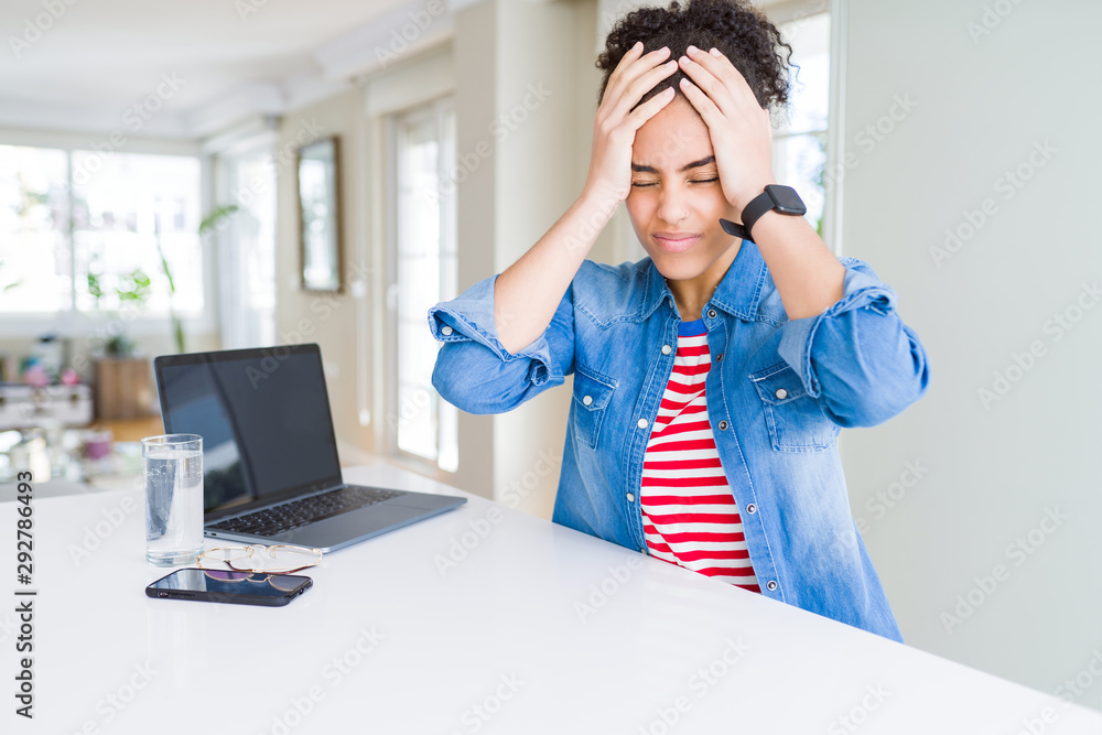 Young african american business woman working using computer laptop ...