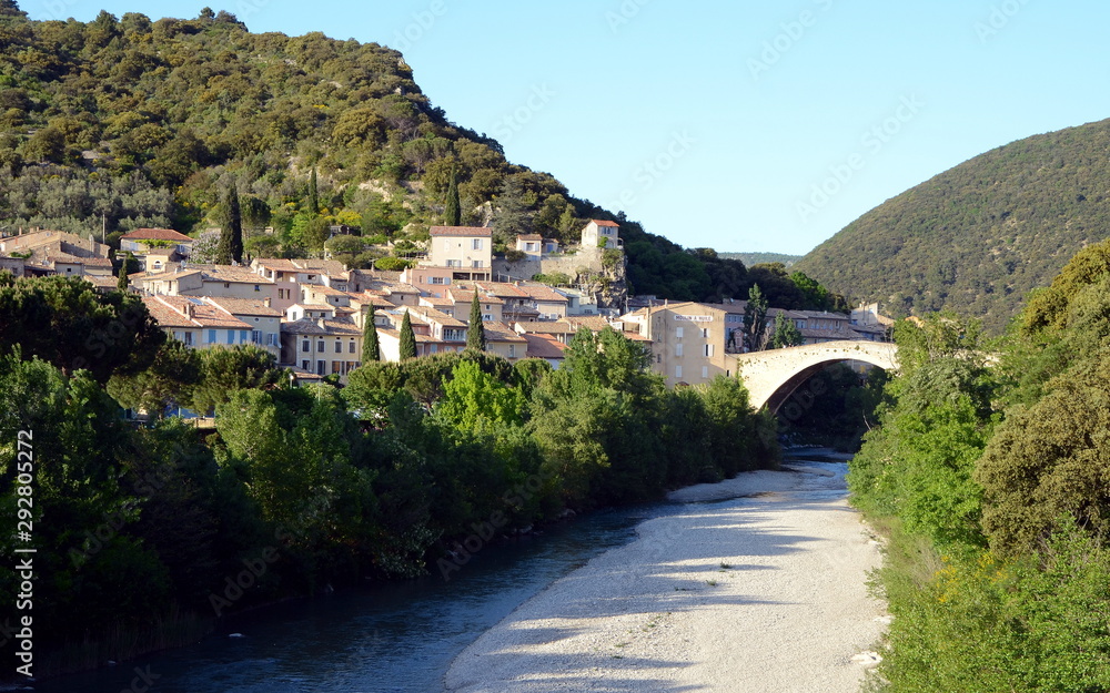 Famous Roman bridge in Nyons. Nyons is a small beautiful village in ...