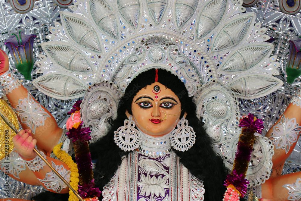 Goddess Durga idol at decorated Durga Puja pandal, shot at colored ...