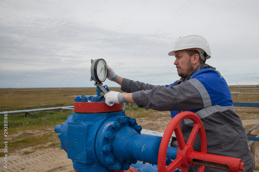 Gas operator, The operator operates the gas well with a torch.The ...