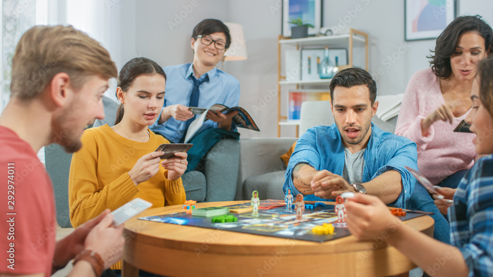Diverse Group of Guys and Girls Playing in a Strategic Board Game with ...