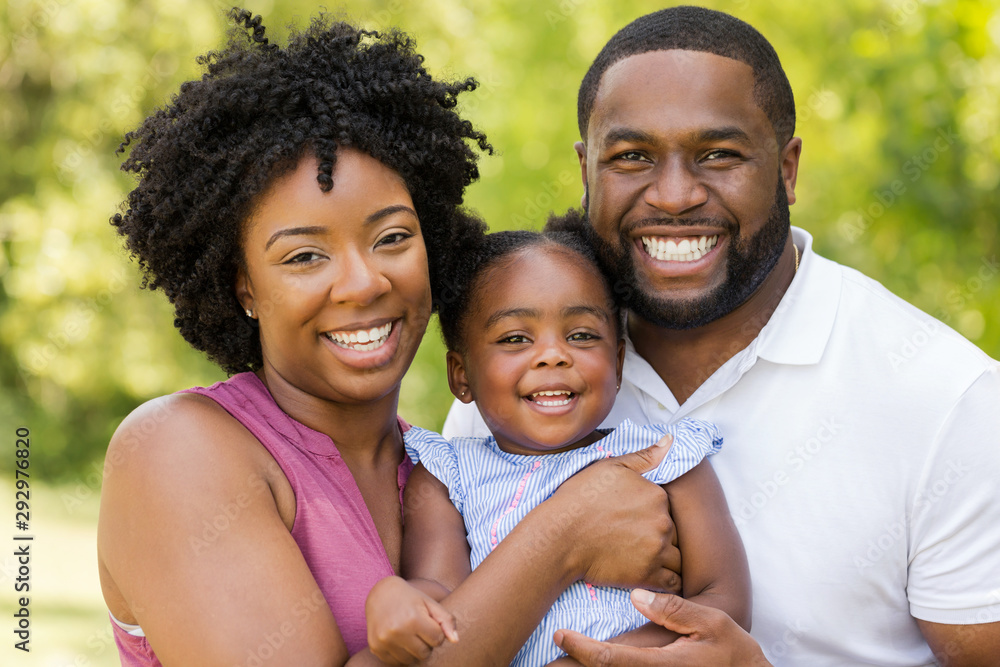 Happy African American family laughing and smiling. Stock Photo | Adobe ...