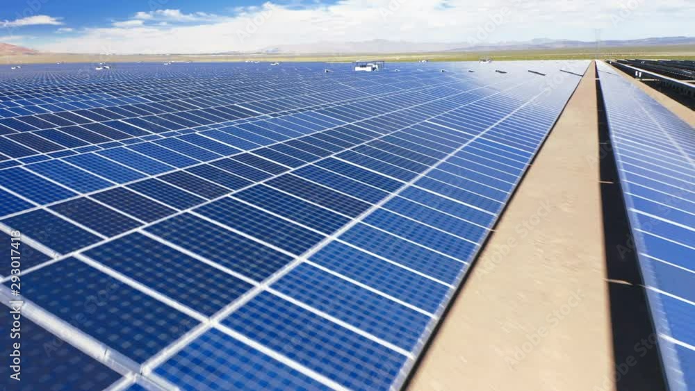 Nevada.Modern solar farm. Low flight over the solar cell panels under ...