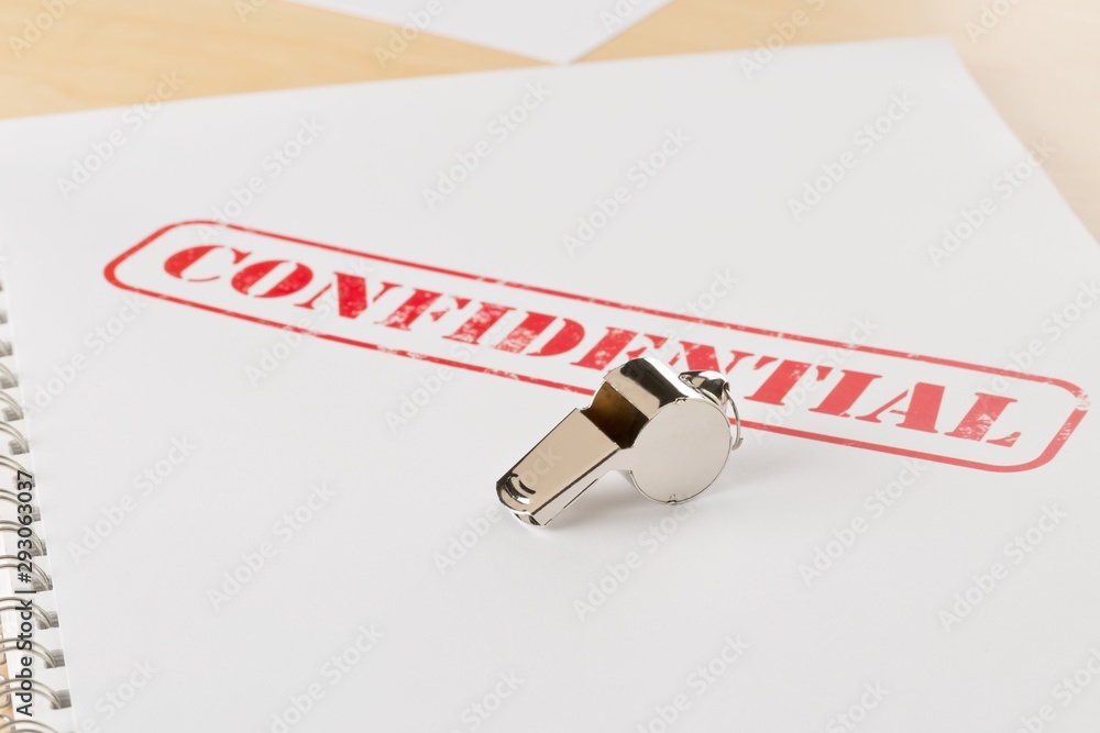 Chrome whistle on documents with confidential top secret information on ...