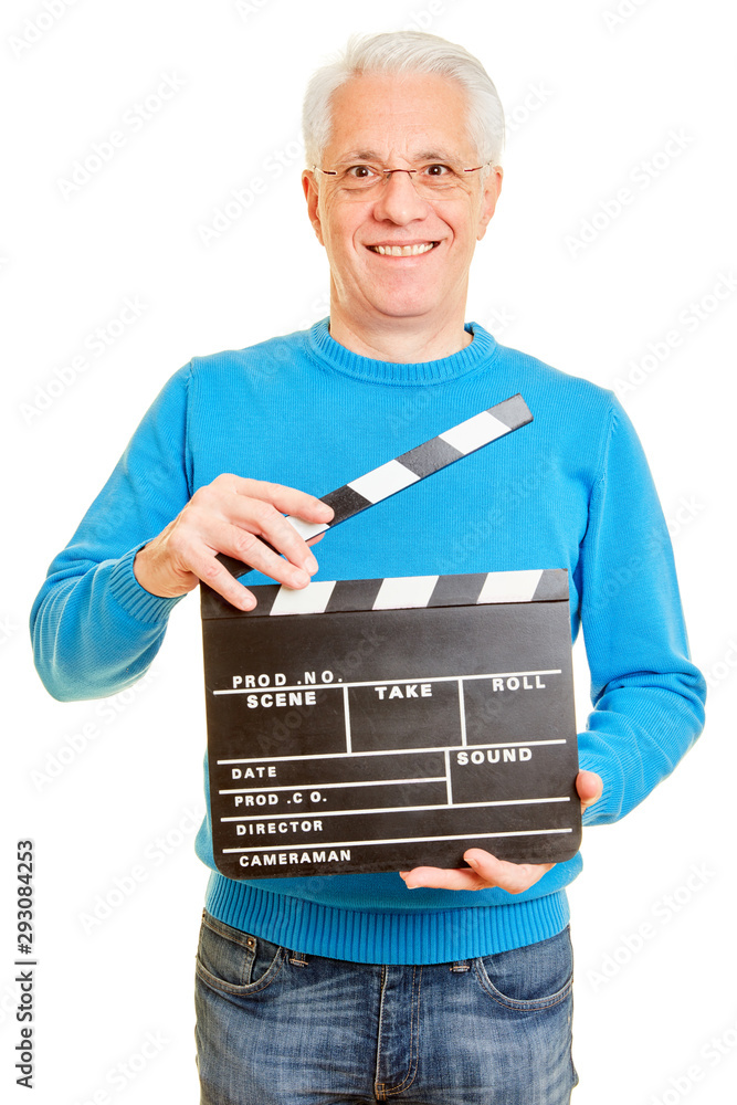 Älterer Regisseur mit Filmklappe beim Filmdreh Stock Photo | Adobe Stock