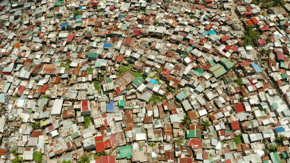 Streets of poor areas in Manila. The roofs of houses and the life of ...