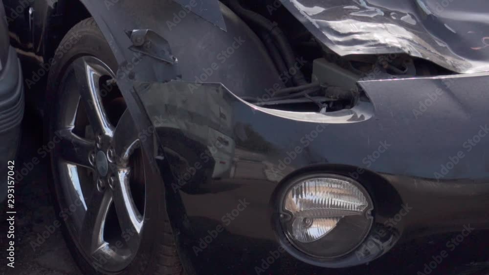 Car after an accident with a broken bumper, wing and hood. Body repair ...