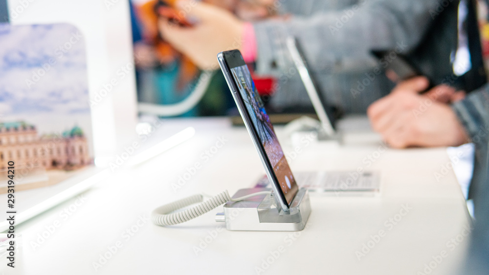 Modern models of mobile phones and gadgets at the technology exhibition ...