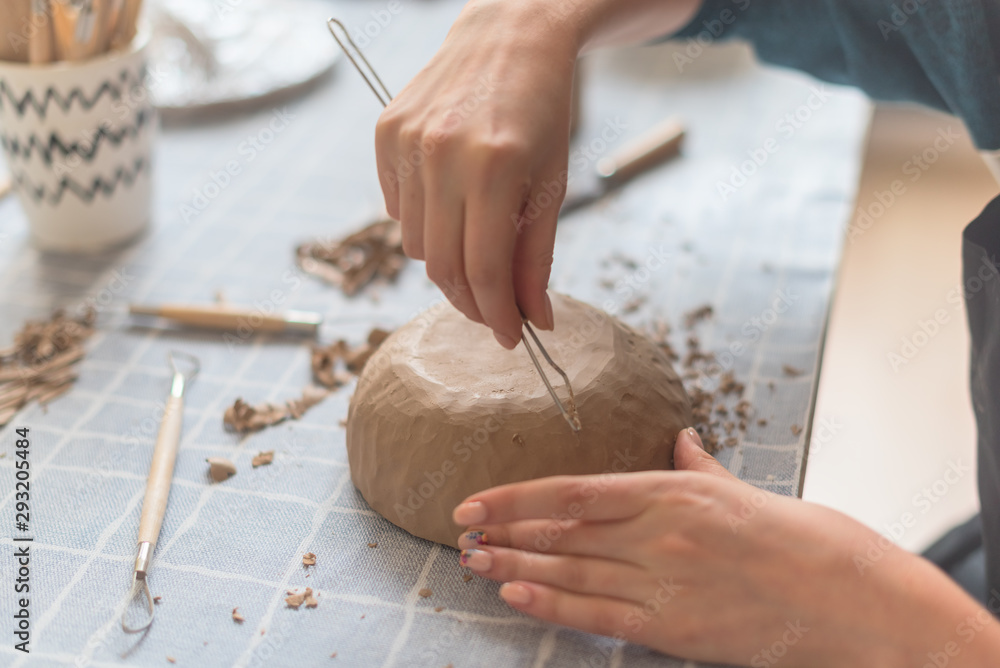 Clay pottery workshop, the process of making ceramic crockery. Woman ...