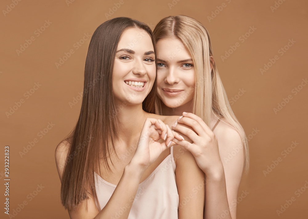 Two Little Girls Laughing With Brown Hair