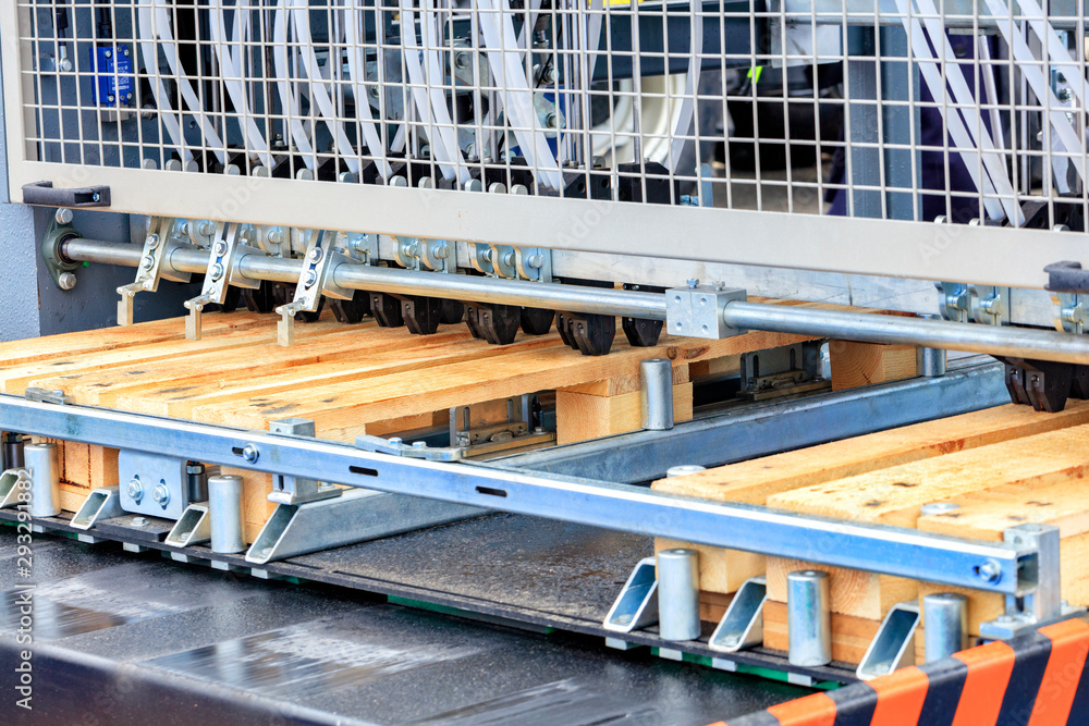 Production of wooden pallets on an automatic line. Stock Photo | Adobe ...