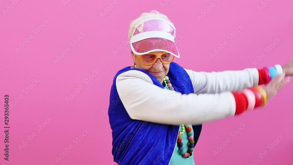Funny grandmother portraits. 80s style outfit. Dab dance on colored ...