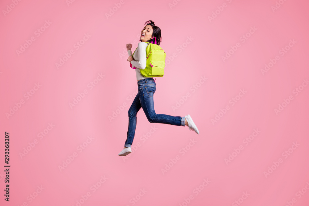 Full body photo of crazy lady jumping high holding green rucksack ...