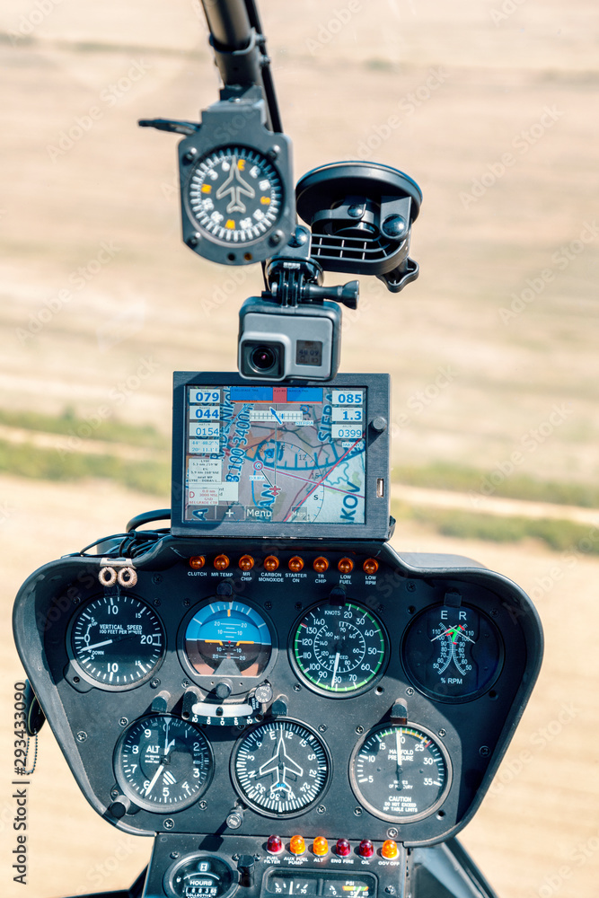 Cockpit of Robinson R44 helicopter during flying Stock Photo | Adobe Stock