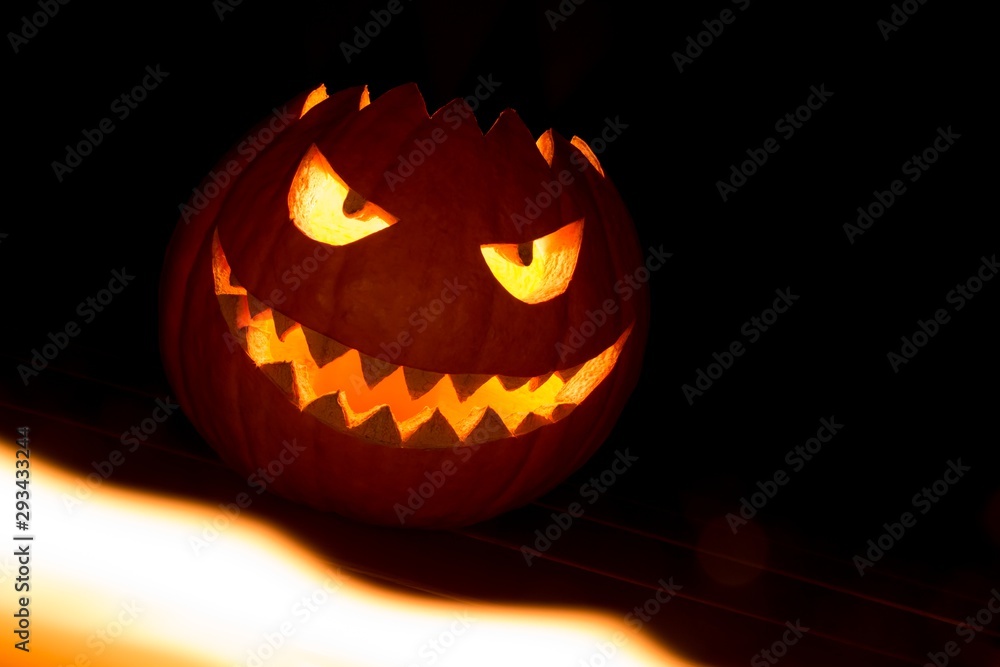 Spooky carved halloween pumpkin in hot burning hell fire flames. Big ...