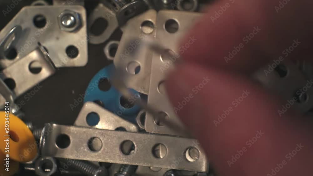 mechanical spare parts.various metal elements of different shapes in a ...
