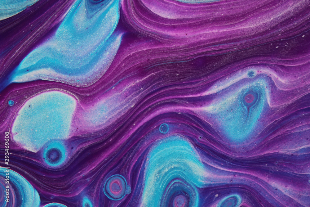 Ghostly blue apparitions linger among bright purple layers in this ...