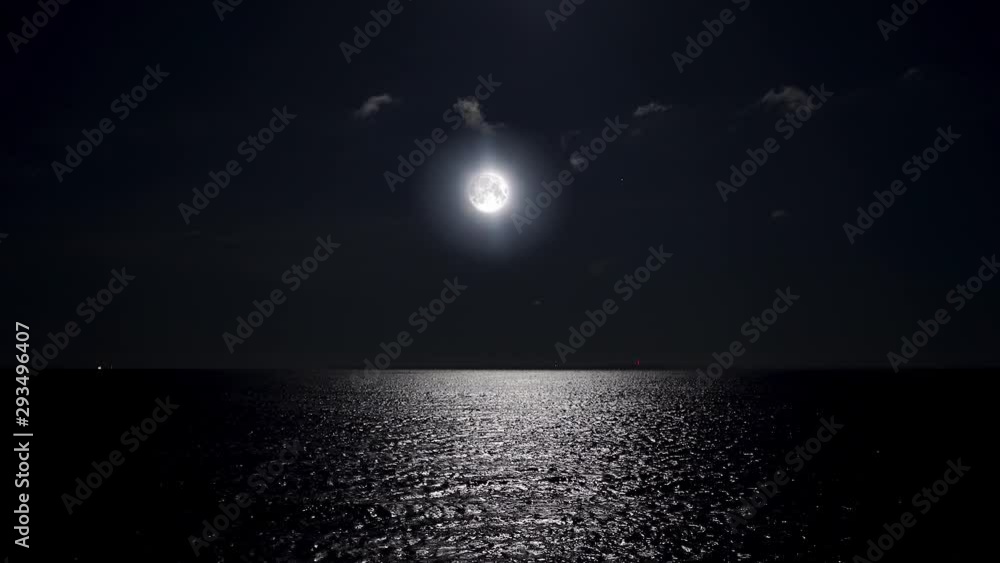 Full moon at night reflecting on the water. Alpha channel moonlight ...