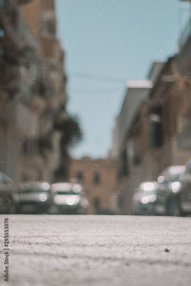Defocused low angle view of a Maltese town narrow street with ...