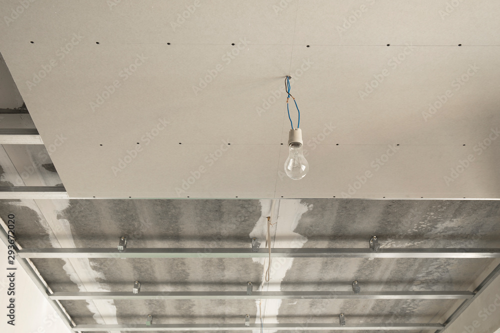 Installation the ceiling profile in the new flat Stock Photo | Adobe Stock