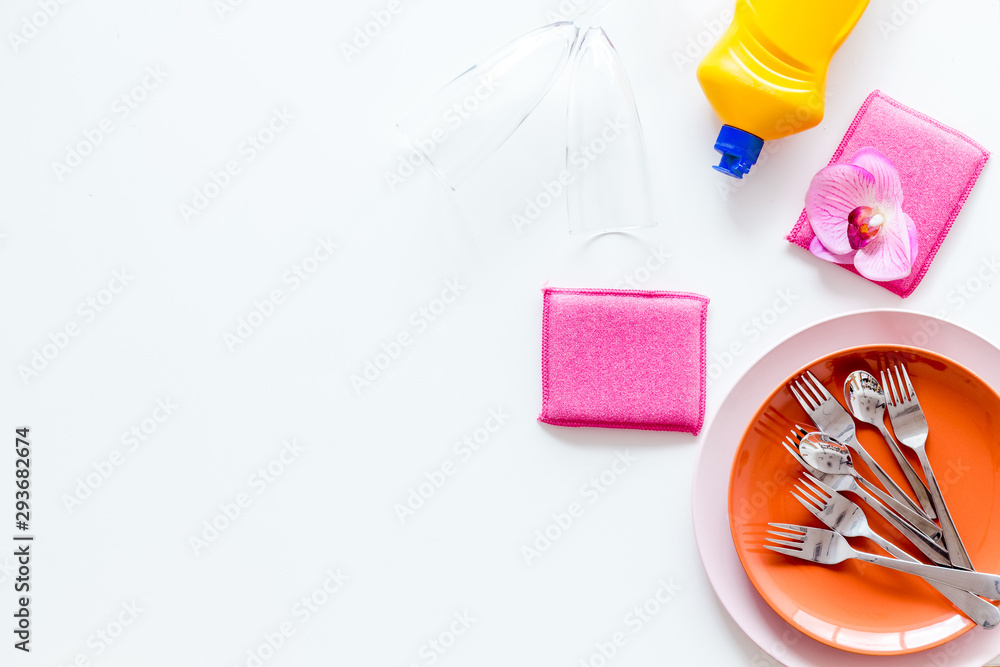 Washing dishes frame with plates, sponges, dishwashing liquid on white ...