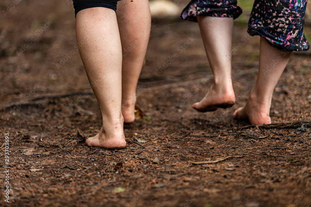 Diverse people enjoy spiritual gathering People walk barefooted on ...