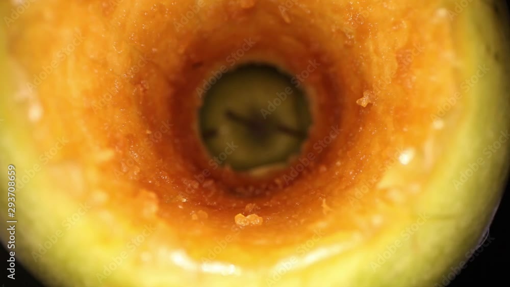 Pushing with varying speeds into the interior of a cored apple ...