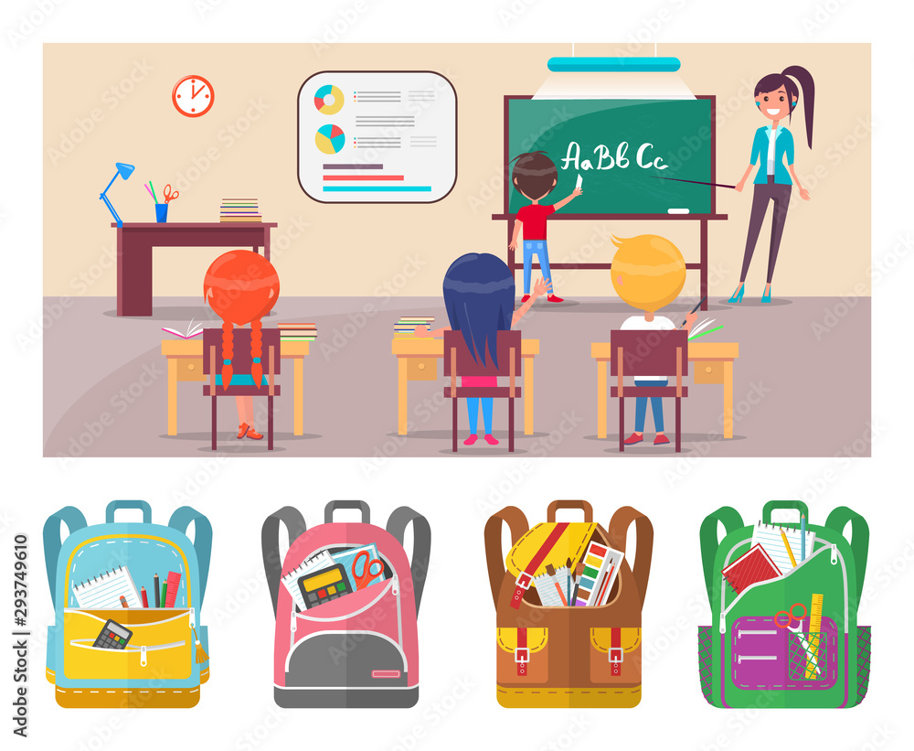 Children learning alphabet at school lesson with teacher. Boy standing ...