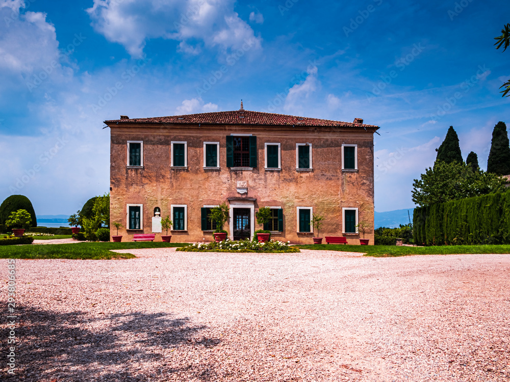 Typical and traditional Italian villa architecture with blue sky ...