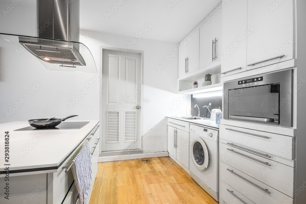 Clean white Kitchens Counter with kitchen equipment in the Apartment ...
