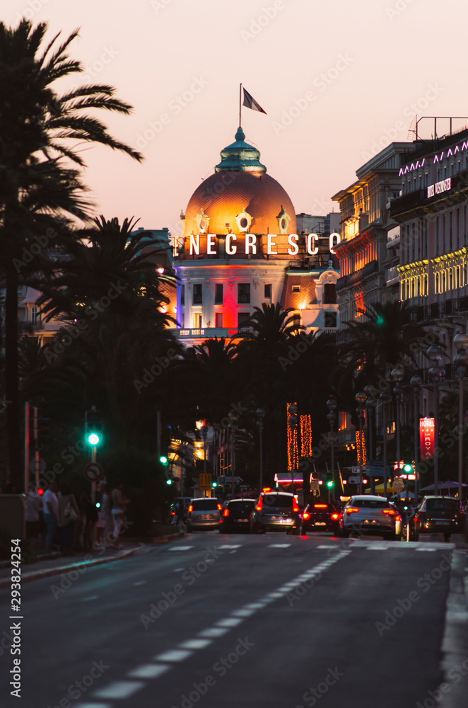 NICE,JULY-JUL.7: negresco hotel is illuinated with the french flag ...